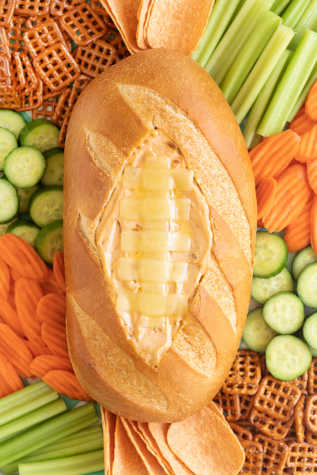 Spicy Onion Dip Served In Football Bread Bowl