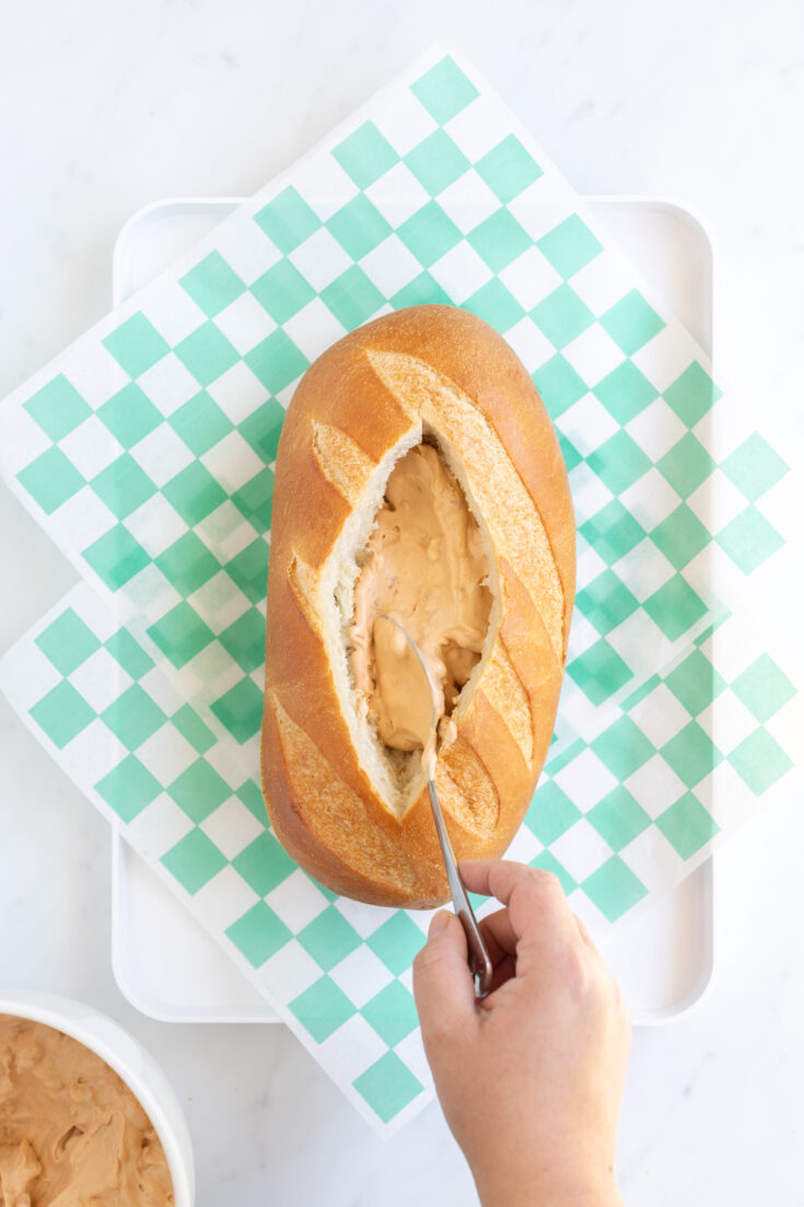 Spicy Onion Dip Served In Football Bread Bowl